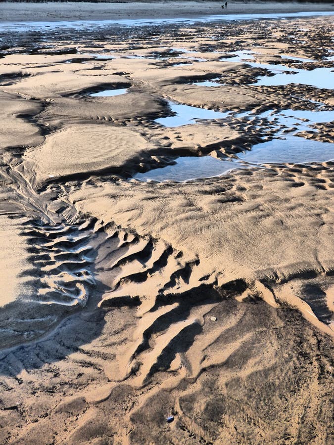 Tidal Designs in the Sand stock photo. Image of shapes - 97176336