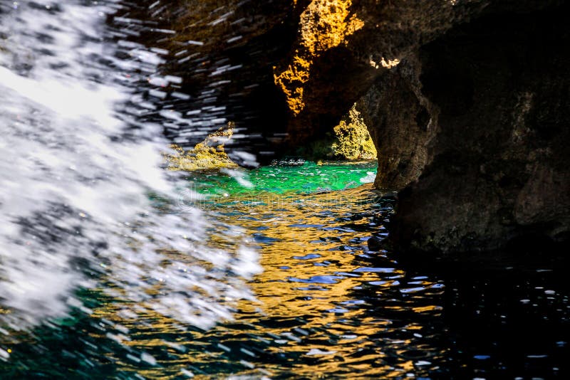 Tidal wave in the cave stock photo. Image of beach, ship - 104500890