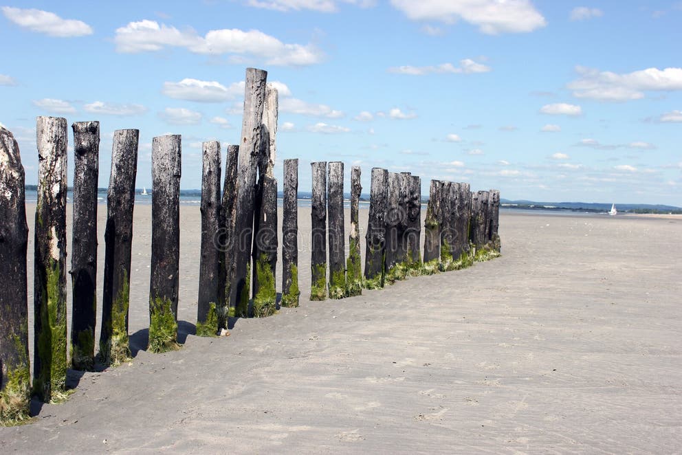 Tide Markers on a Beach Landscape Stock Photo - Image of walk ...
