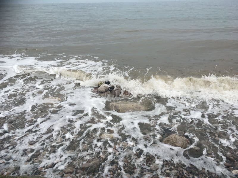 The Tide of the Ocean Crashes on the Shore Stock Image - Image of ...