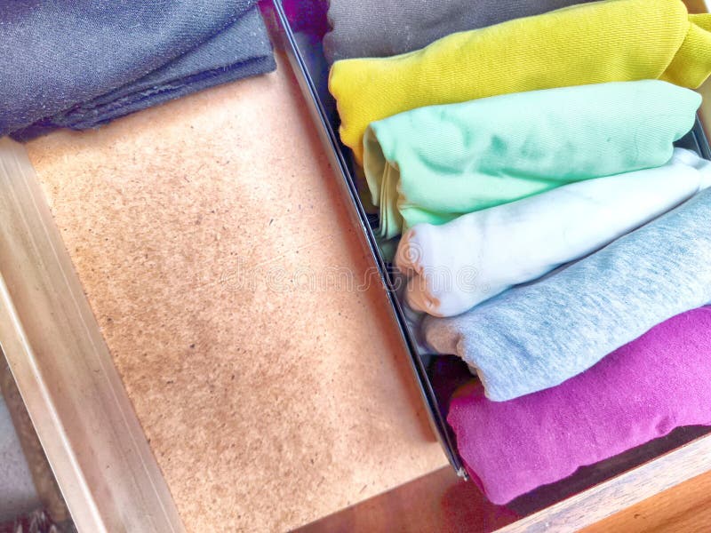 Tidy and Organized Clothes with the Konmari Method. Storage of T-shirts ...