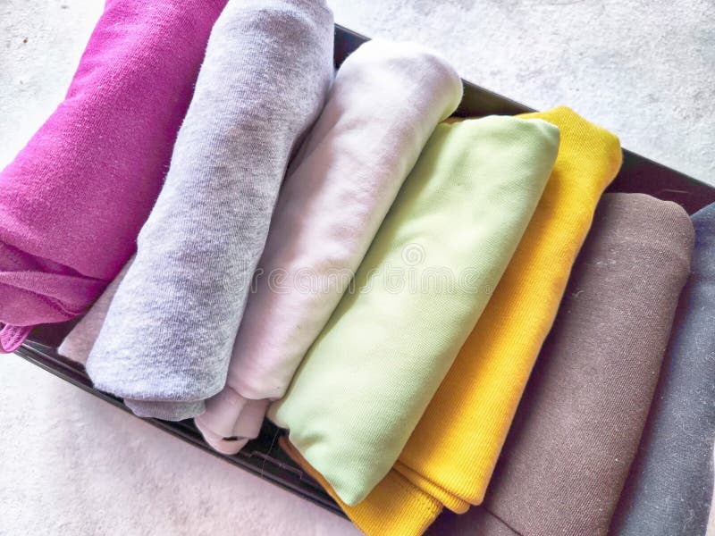 Tidy and Organized Clothes with the Konmari Method. Storage of T-shirts ...