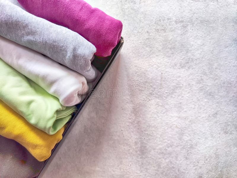 Tidy and Organized Clothes with the Konmari Method. Storage of T-shirts ...