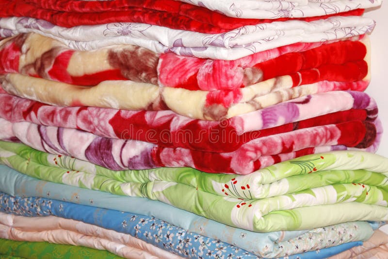 Tidy Quilt with Cotton Wadding Stock Photo - Image of stack, bedding ...