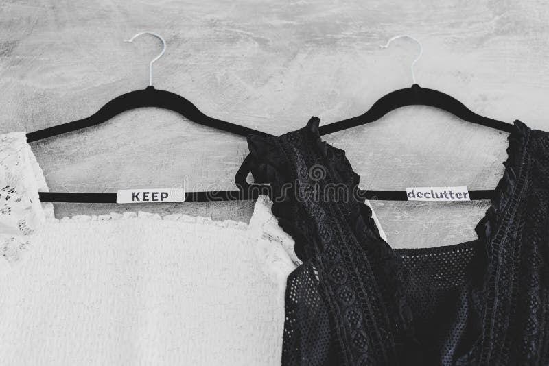 Tidying Up and Decluttering, Clothes Hangers with Black and White Tops ...