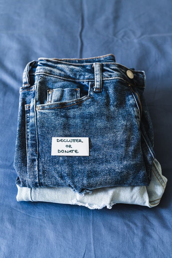 Declutter and Donate Label on Different Jeans in Various Denim Colors ...