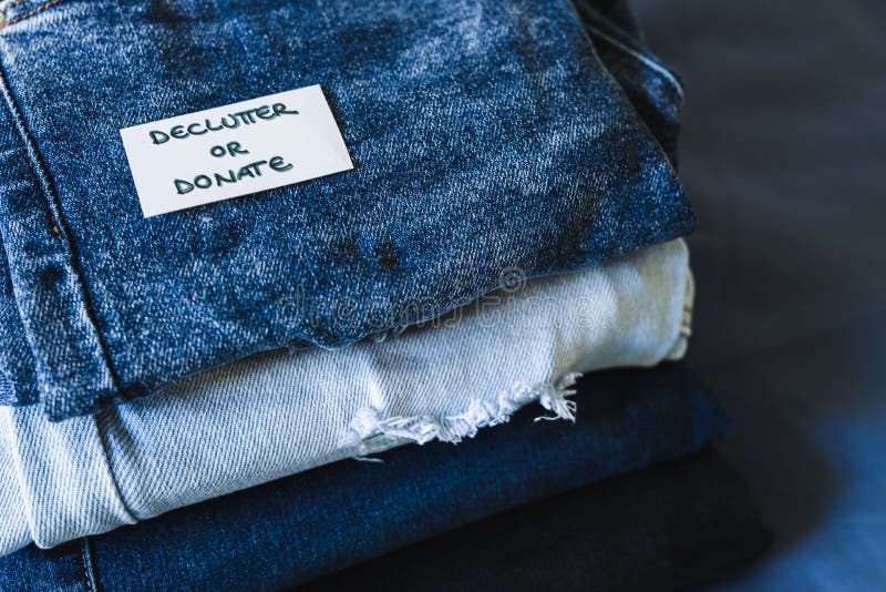 Declutter and Donate Label on Different Jeans in Various Denim Colors ...