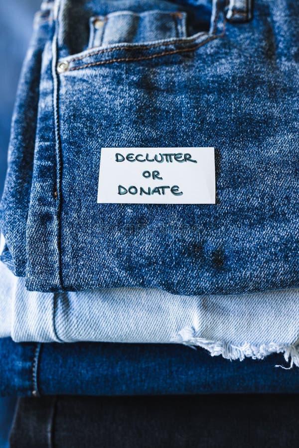 Declutter and Donate Label on Different Jeans in Various Denim Colors ...