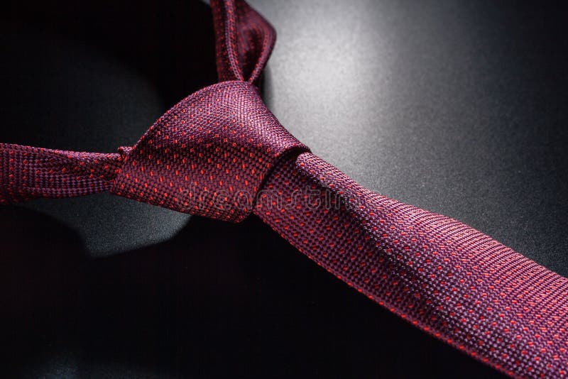 Tied Red a Tie on a Dark Table. Stock Photo - Image of adult, closeup ...