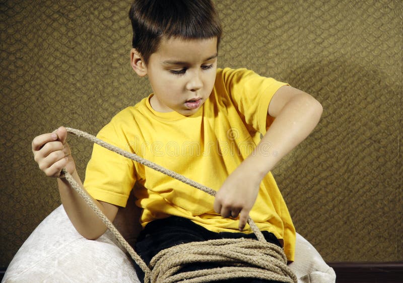 Tied up kid stock photo. Image of rope, western, expression - 27696056