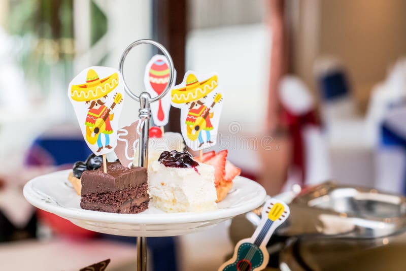 Cake in hotel stock photo. Image of icing, flower, plate - 126057186