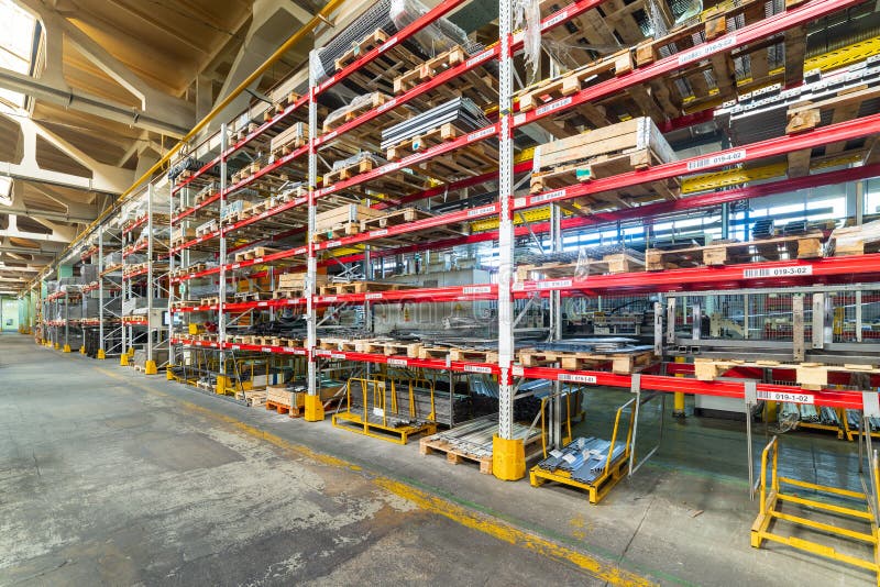 Tiered Rack with Sheet Metal Rolls. Internal Warehouse of Raw Materials ...