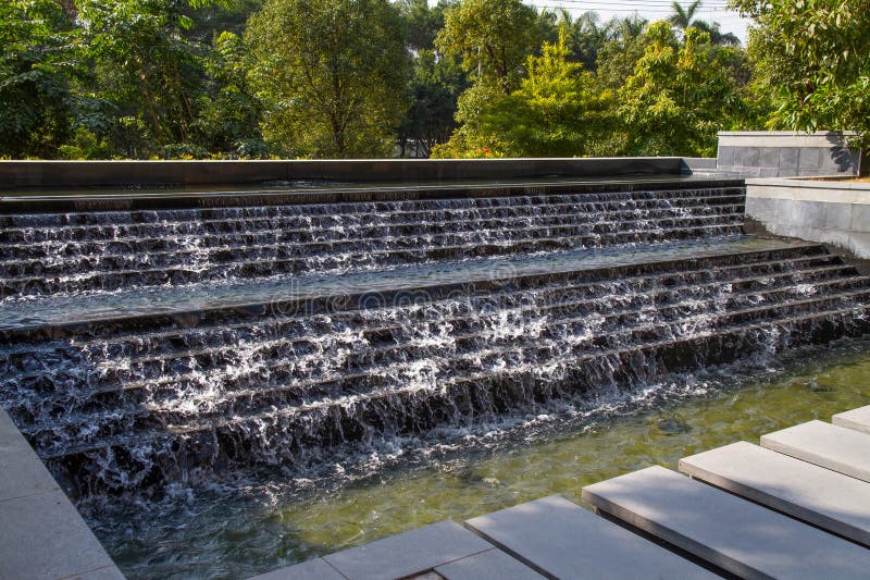 A tiered water cascade stock photo. Image of feature - 277868634