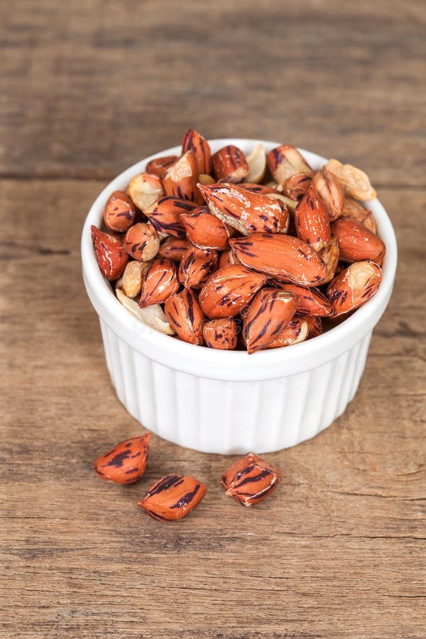 Tiger Peanut in Bowl on Wood Stock Image - Image of salted, peanuts ...