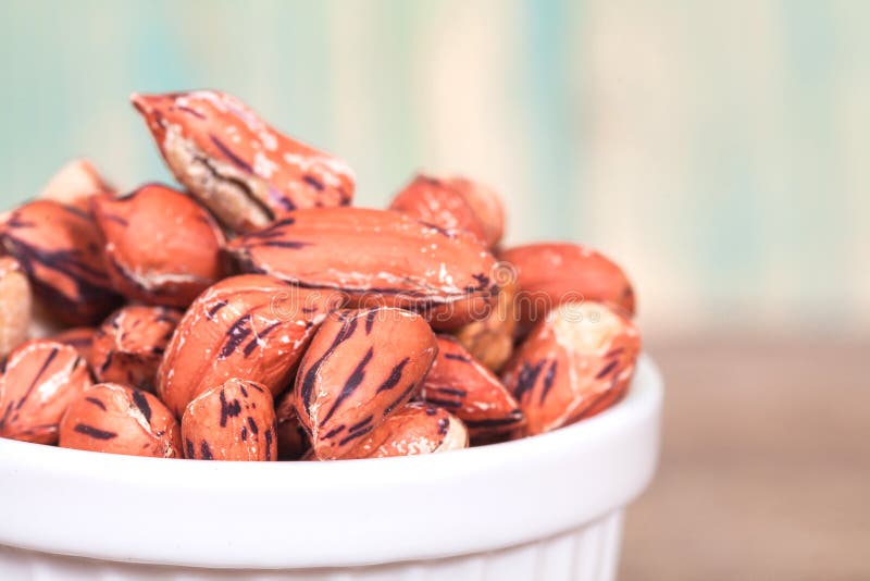 Tiger peanut in bowl stock photo. Image of white, wooden - 67929372