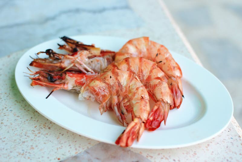 Two prawns on a shell stock photo. Image of ingredient - 26707096
