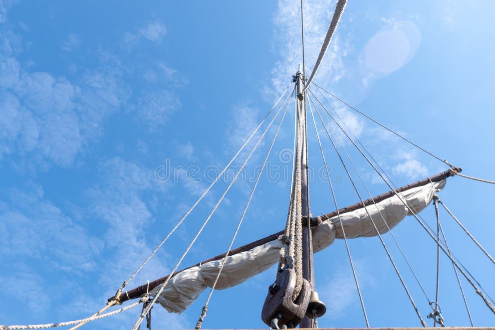 Tigging and Masts of an Old Sailing Ship Against the Blue Sky with ...