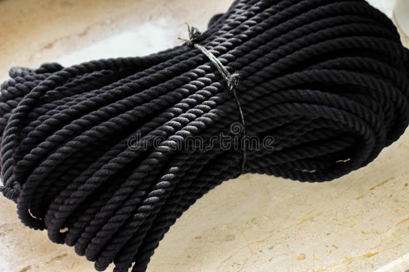 Neatly Bundled Black Synthetic Rope for Boating, Survival, and ...