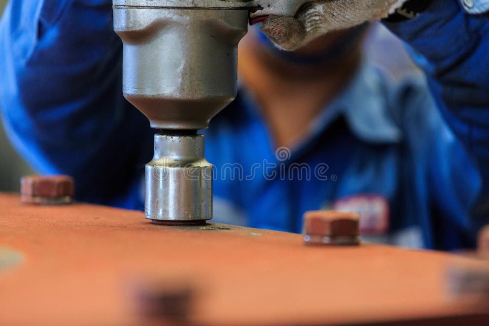 Tighten Bolt with Pneumatic Torque Wrench Stock Image - Image of worker ...