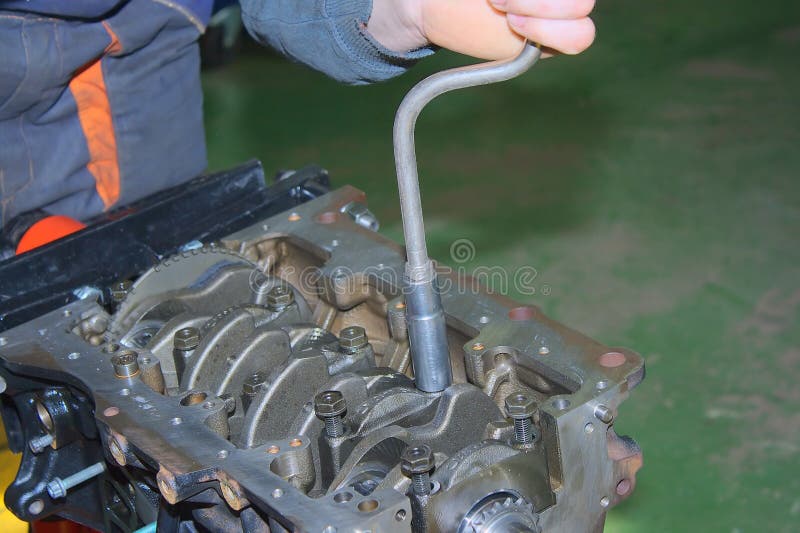 Tightening connecting rod stock photo. Image of camshaft - 38639816