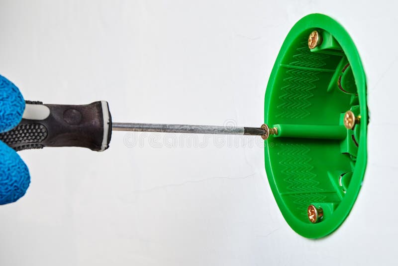 Two Round Electrical Outlet Boxes without Wires Mounted Inside ...