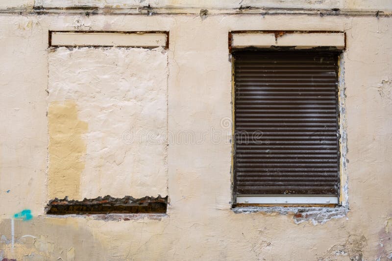A Blocked Window and a Window Closed with a Roller Shutter in the Old ...