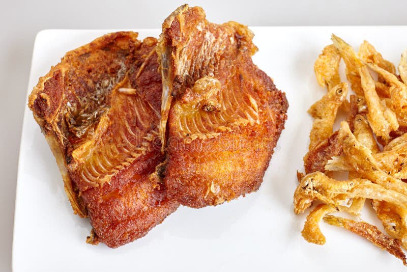 Tilapia Fish Fried and White Bait Fish Fried - Close Up, Top View Stock ...