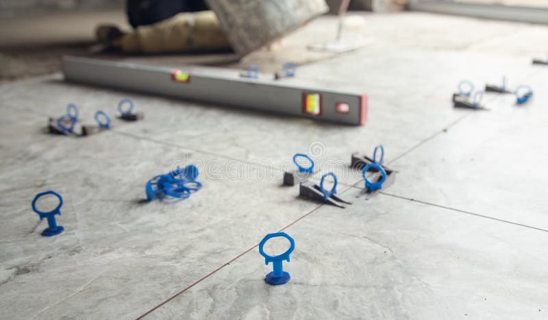 Tile Alignment System. Renovating the Floor Stock Photo - Image of ...
