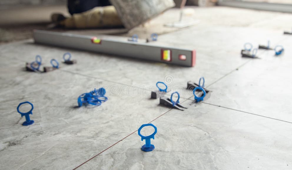 Tile Alignment System. Renovating the Floor Stock Photo - Image of ...
