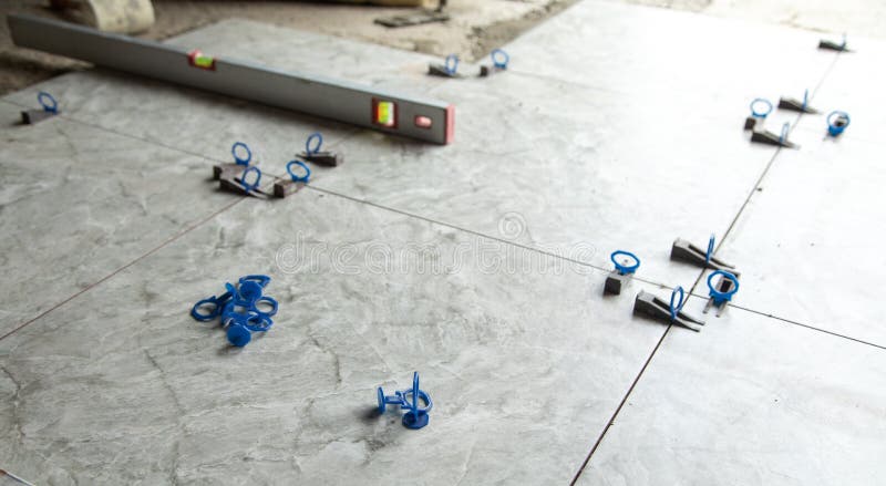 Tile Alignment System. Renovating the Floor Stock Image - Image of ...