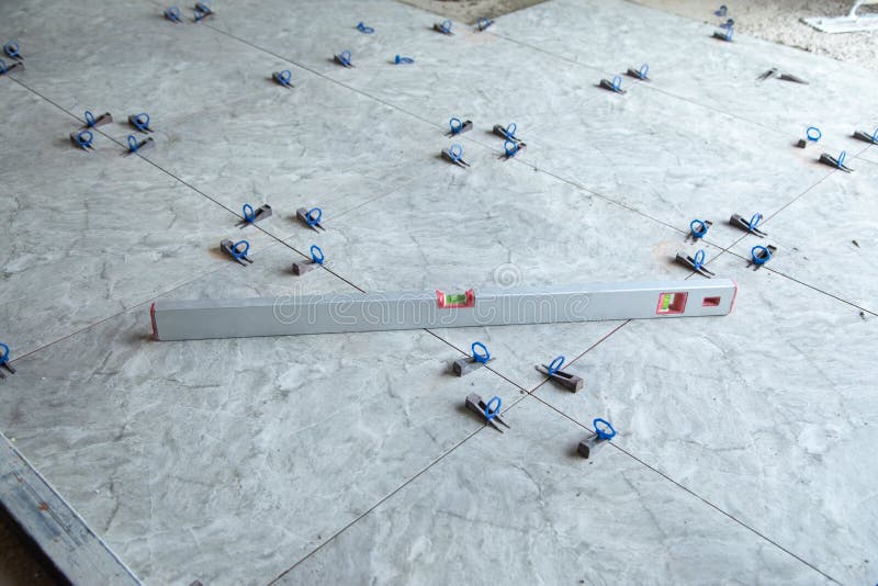 Tile Alignment System. Renovating the Floor Stock Photo - Image of ...