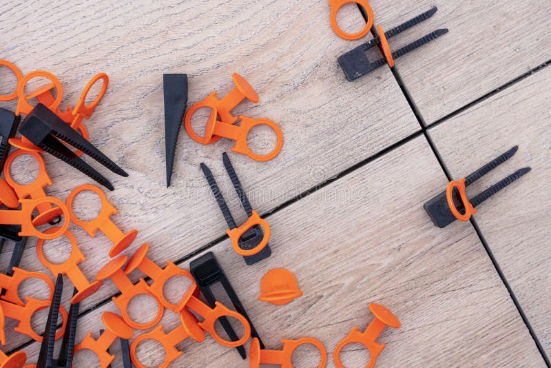 Tile Leveling System with Plastic Clips and Wedges. Repair School Stock ...