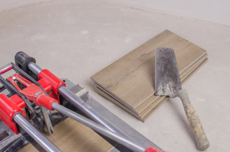 Tile Cutter with Ceramic Tiles and Ruler Stock Photo - Image of laborer ...