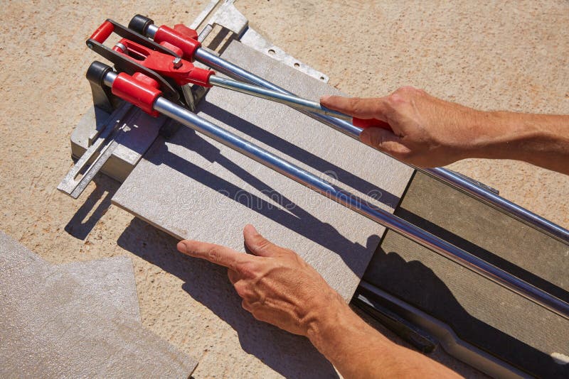 Tile Cutter Machine with Mason Hands Cutting Stock Image - Image of ...