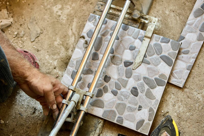 Tile Cutter is Used by Tiler for Interior Construction Work. Stock ...