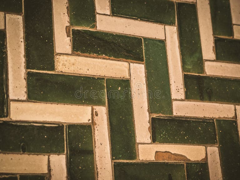 Tile Floor with Alternating Green and White Patterned Tiles. Editorial ...