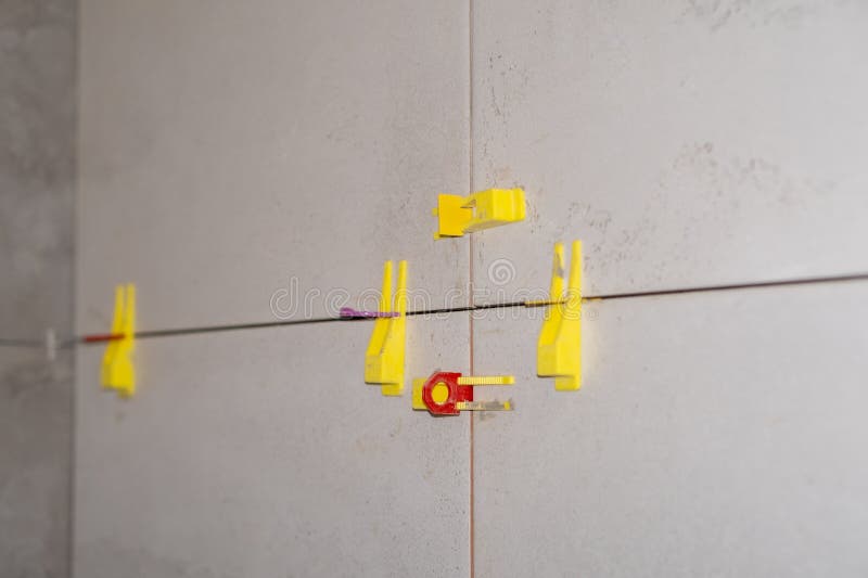 Tile Installation Using Plastic Leveling Clips and Wedges. Ensuring a ...