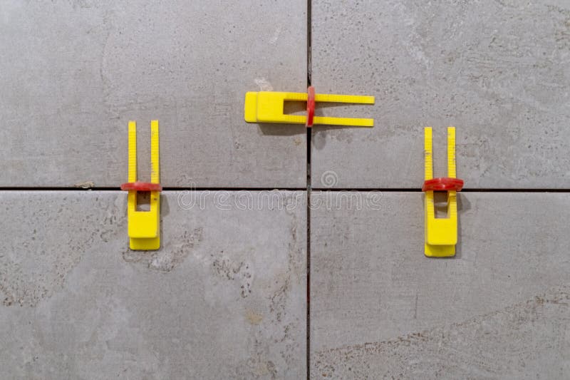Tile Installation Using Plastic Leveling Clips and Wedges. Ensuring a ...
