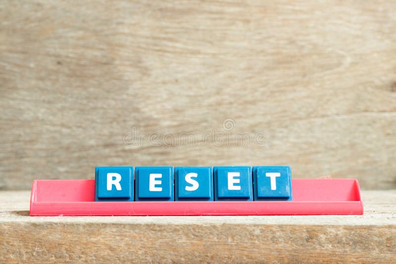 Tile Letter on Rack in Word Reset on Wood Background Stock Photo ...