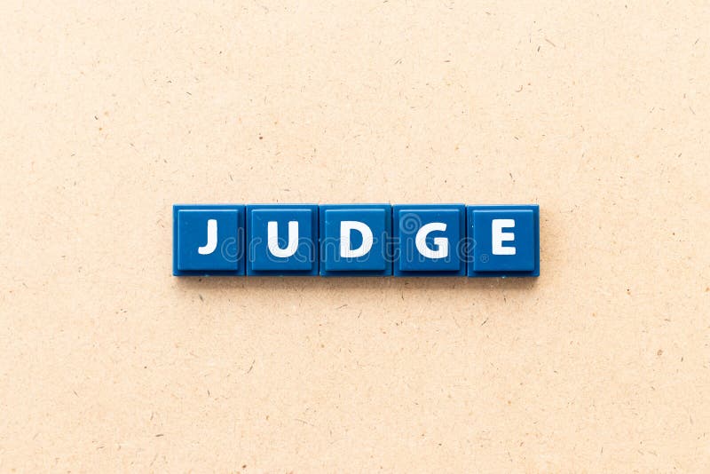 Word Judge Written in Wooden Blocks in Red Notebook on White Woo Stock ...