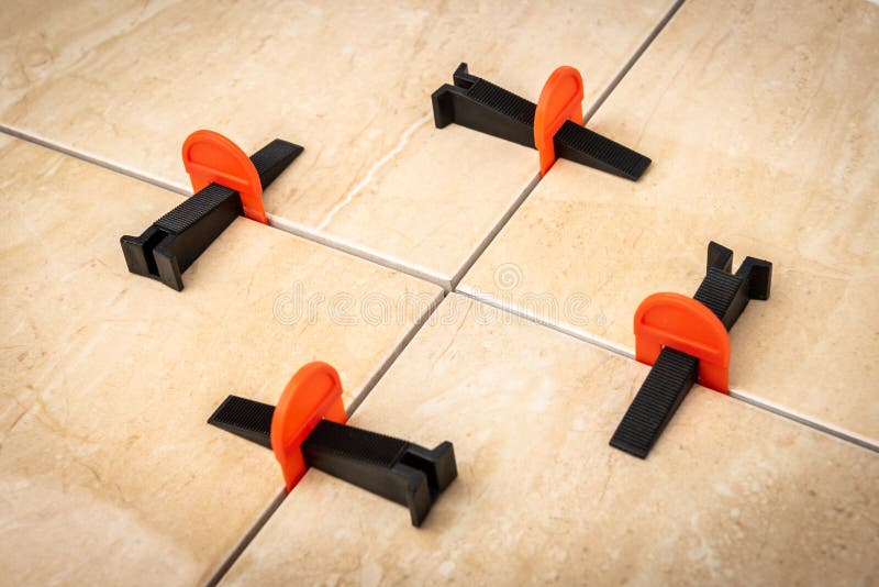 Tile Levelling System with Plastic Clips and Wedges Stock Image - Image ...