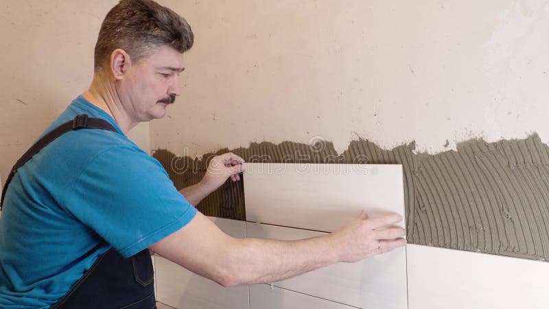 Tile Maker Performs the Work of Laying Tiles Stock Video - Video of ...