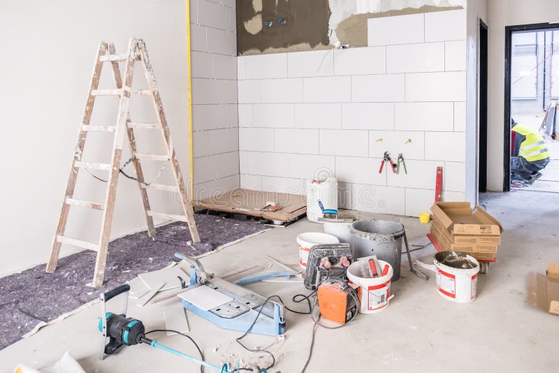 Tile man and his tools stock photo. Image of bags, tile - 84516178