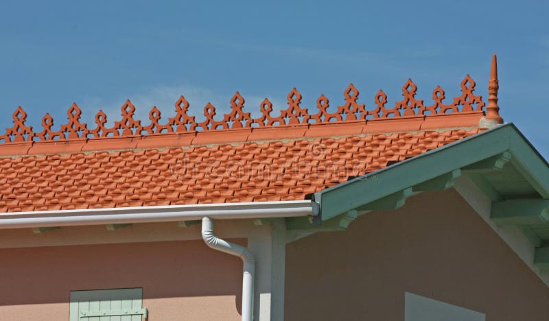 Tile Roof of a House with a Decorative Ridge Stock Photo - Image of ...