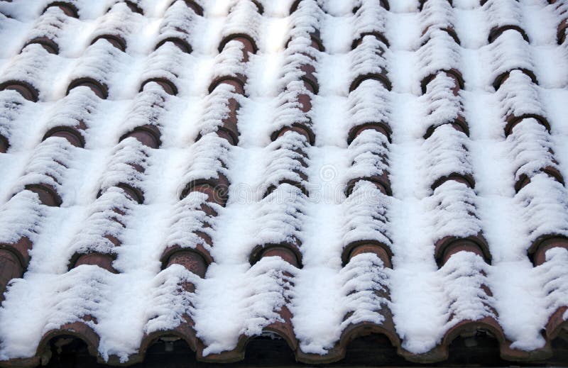 Tile roof in snow stock photo. Image of background, snow - 36318954