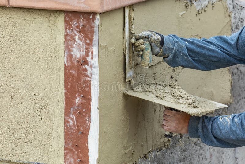 Tile Worker Applying Cement with Trowel at Pool Construction Site Stock ...