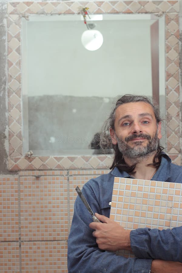 Tile worker posing stock image. Image of tiler, profession - 25065795