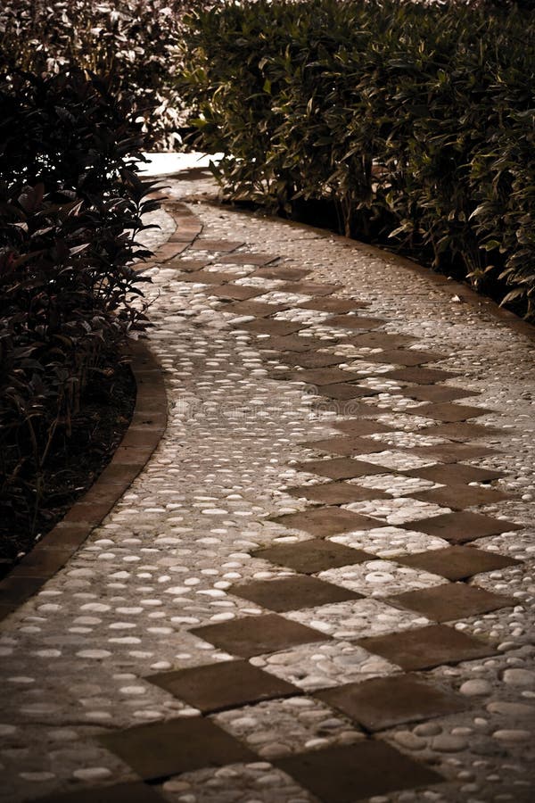 A tiled cobblestone path stock image. Image of cobble - 4851475