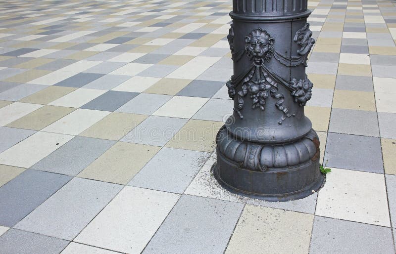 Tiled Ground and Historic Pillar with Ornaments Stock Photo - Image of ...