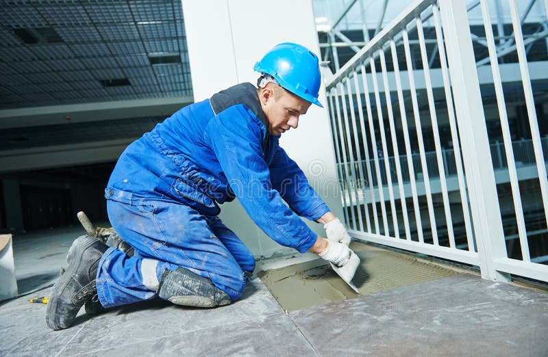 Tiler at Industrial Floor Tiling Renovation Work Stock Photo - Image of ...